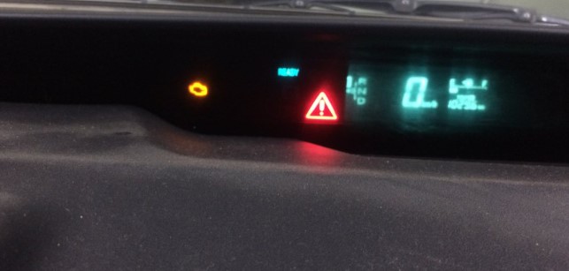 Why is the Toyota Prius Red Triangle Warning Light on? Fixed